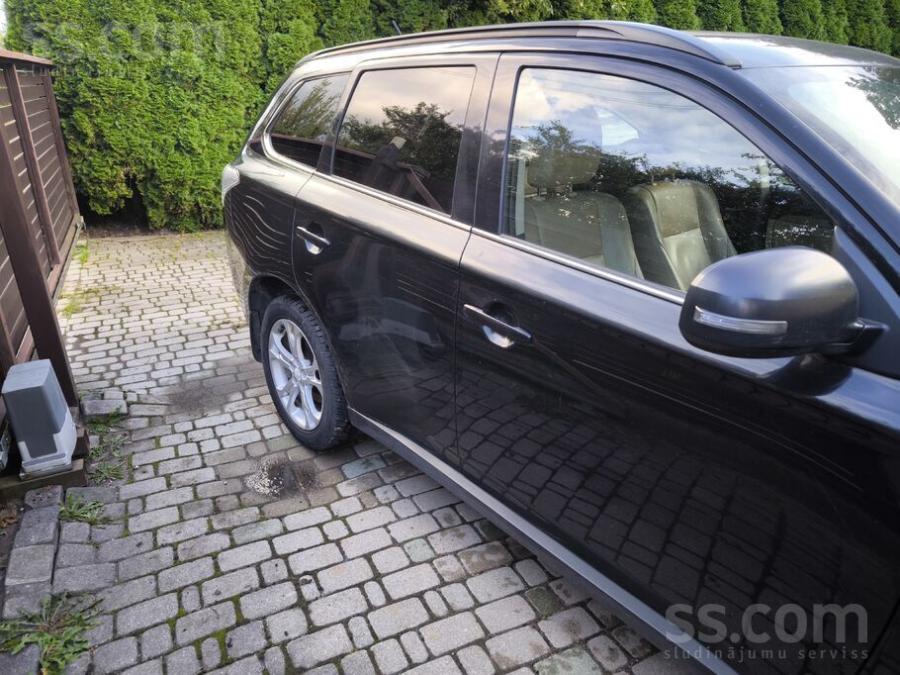 Melns Mitsubishi Outlander 2014 Rīga, ar dzinēja tilpumu 2.00 L un nobraukumu 308 tūkst. km par 4000 €, foto 5 vietnē AUTOMOTO.COM.LV