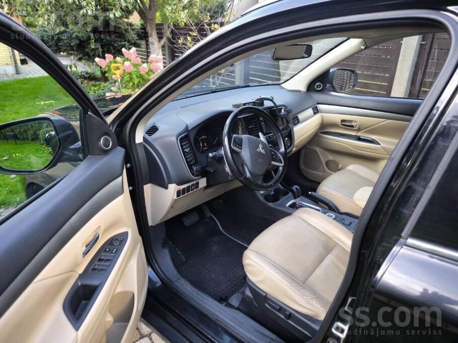 Melns Mitsubishi Outlander 2014 Rīga, ar dzinēja tilpumu 2.00 L un nobraukumu 308 tūkst. km par 4000 €, foto 6 vietnē AUTOMOTO.COM.LV