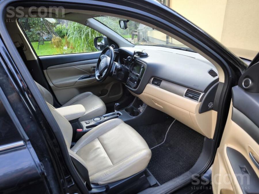 Melns Mitsubishi Outlander 2014 Rīga, ar dzinēja tilpumu 2.00 L un nobraukumu 308 tūkst. km par 4000 €, foto 8 vietnē AUTOMOTO.COM.LV