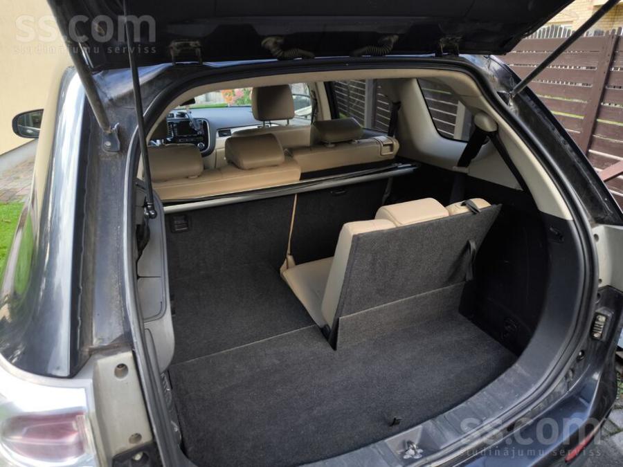 Melns Mitsubishi Outlander 2014 Rīga, ar dzinēja tilpumu 2.00 L un nobraukumu 308 tūkst. km par 4000 €, foto 10 vietnē AUTOMOTO.COM.LV