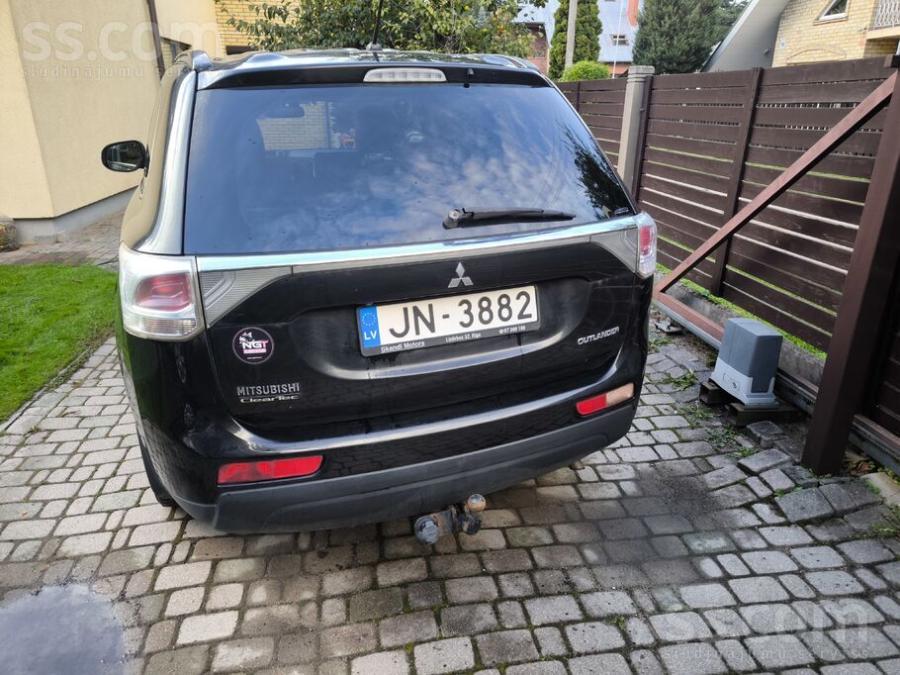 Melns Mitsubishi Outlander 2014 Rīga, ar dzinēja tilpumu 2.00 L un nobraukumu 308 tūkst. km par 4000 €, foto 12 vietnē AUTOMOTO.COM.LV