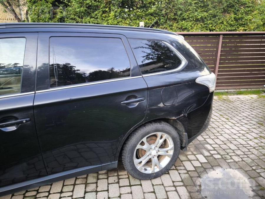 Melns Mitsubishi Outlander 2014 Rīga, ar dzinēja tilpumu 2.00 L un nobraukumu 308 tūkst. km par 4000 €, foto 13 vietnē AUTOMOTO.COM.LV