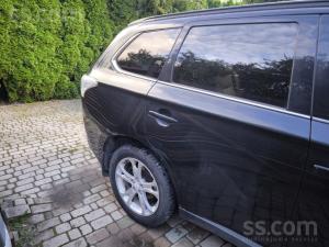 Melns Mitsubishi Outlander 2014 Rīga, ar dzinēja tilpumu 2.00 L un nobraukumu 308 tūkst. km par 4000 €, foto 14 vietnē AUTOMOTO.COM.LV