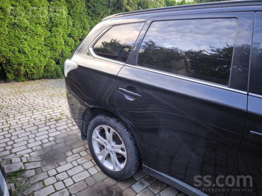 Melns Mitsubishi Outlander 2014 Rīga, ar dzinēja tilpumu 2.00 L un nobraukumu 308 tūkst. km par 4000 €, foto 14 vietnē AUTOMOTO.COM.LV