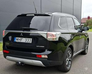 Melns Mitsubishi Outlander 2014 Kauņa, ar dzinēja tilpumu 2.30 L un nobraukumu 209 tūkst. km par 8600 €, foto 4 vietnē AUTOMOTO.COM.LV
