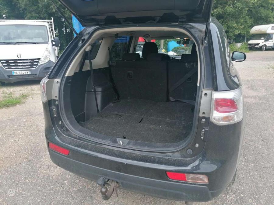 Melns Mitsubishi Outlander 2014 Tauragė, ar dzinēja tilpumu 2.27 L un nobraukumu 202 tūkst. km par 7400 €, foto 6 vietnē AUTOMOTO.COM.LV