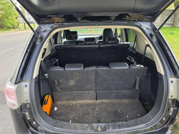 Black Mitsubishi Outlander 2014 in Jonava, with an engine capacity of 2.30 L and mileage of 132 thousand km for 2999 €, photo 9 on AUTOMOTO.COM.LV