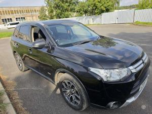Black Mitsubishi Outlander 2014 in Jonava, with an engine capacity of 2.30 L and mileage of 132 thousand km for 2999 €, photo 11 on AUTOMOTO.COM.LV
