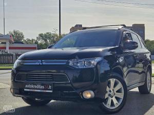 Black Mitsubishi Outlander 2014 in Siauliai, with an engine capacity of 2.00 L and mileage of 269 thousand km for 7950 €, photo 4 on AUTOMOTO.COM.LV