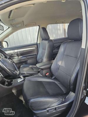 Black Mitsubishi Outlander 2014 in Siauliai, with an engine capacity of 2.00 L and mileage of 269 thousand km for 7950 €, photo 19 on AUTOMOTO.COM.LV