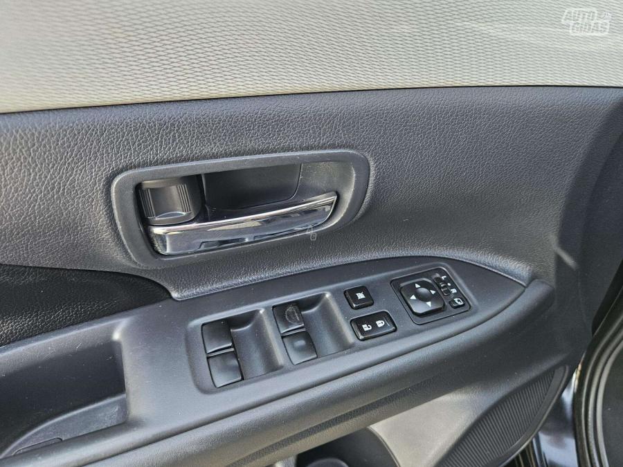 Black Mitsubishi Outlander 2014 in Siauliai, with an engine capacity of 2.00 L and mileage of 269 thousand km for 7950 €, photo 24 on AUTOMOTO.COM.LV