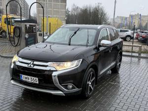 Melns Mitsubishi Outlander 2015 Kauņa, ar dzinēja tilpumu 2.27 L un nobraukumu 171 tūkst. km par 10448 €, foto  vietnē AUTOMOTO.COM.LV