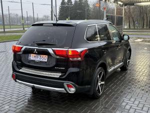Black Mitsubishi Outlander 2015 in Kaunas, with an engine capacity of 2.27 L and mileage of 171 thousand km for 10448 €, photo 4 on AUTOMOTO.COM.LV