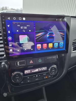 Black Mitsubishi Outlander 2015 in Ukmerge, with an engine capacity of 2.00 L and mileage of 268 thousand km for 8000 €, photo 10 on AUTOMOTO.COM.LV