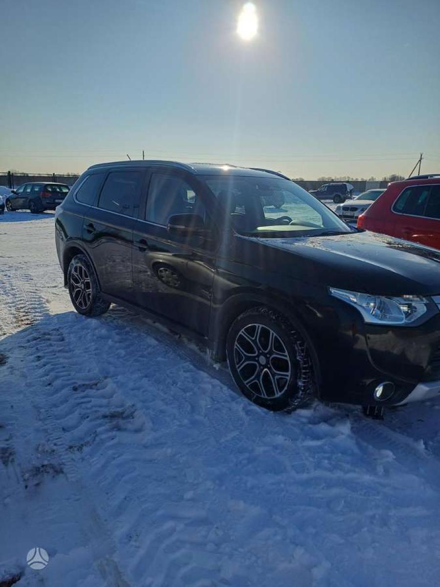 Черный Мицубиси Аутлендер 2015 в Паневежис, объемом двигателя 2.27 л и пробегом 190 тыс. км за 9800 €, фото 1 на AUTOMOTO.COM.LV