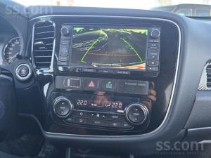 Black Mitsubishi Outlander 2015 in Ogre, with an engine capacity of 2.20 L and mileage of 261 thousand km for 8700 €, photo 15 on AUTOMOTO.COM.LV