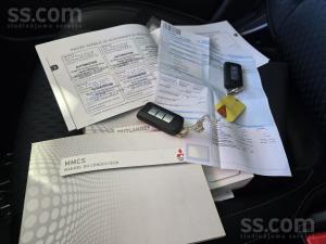 Black Mitsubishi Outlander 2015 in Ogre, with an engine capacity of 2.20 L and mileage of 261 thousand km for 8700 €, photo 16 on AUTOMOTO.COM.LV