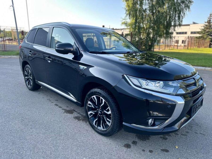 Melns Mitsubishi Outlander 2015 Rokiškis, ar dzinēja tilpumu 2.00 L un nobraukumu 280 tūkst. km par 7650 €, foto 4 vietnē AUTOMOTO.COM.LV