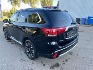 Melns Mitsubishi Outlander 2015 Rokiškis, ar dzinēja tilpumu 2.00 L un nobraukumu 280 tūkst. km par 7650 €, foto 7 vietnē AUTOMOTO.COM.LV