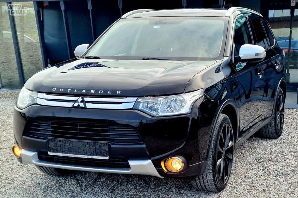 Black Mitsubishi Outlander 2015 in Kretinga, with an engine capacity of 2.30 L and mileage of 245 thousand km for 8450 €, photo 1 on AUTOMOTO.COM.LV