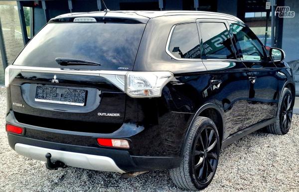 Black Mitsubishi Outlander 2015 in Kretinga, with an engine capacity of 2.30 L and mileage of 245 thousand km for 8450 €, photo 8 on AUTOMOTO.COM.LV