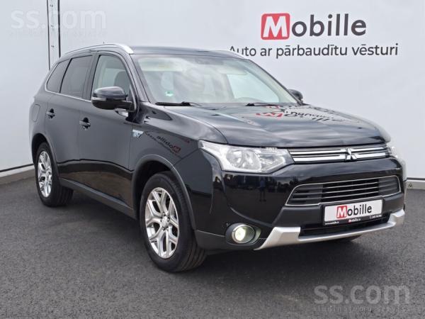 Melns Mitsubishi Outlander 2015 Rīga, ar dzinēja tilpumu 2.00 L un nobraukumu 277 tūkst. km par 8750 €, foto 1 vietnē AUTOMOTO.COM.LV
