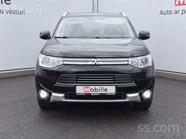 Melns Mitsubishi Outlander 2015 Rīga, ar dzinēja tilpumu 2.00 L un nobraukumu 277 tūkst. km par 8750 €, foto 2 vietnē AUTOMOTO.COM.LV