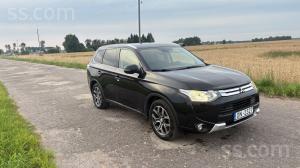 Melns Mitsubishi Outlander 2015 Cēsis, ar dzinēja tilpumu 2.20 L un nobraukumu 288 tūkst. km par 8500 €, foto 3 vietnē AUTOMOTO.COM.LV