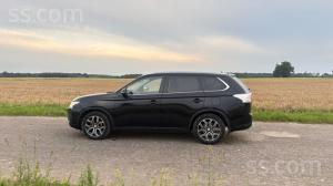 Melns Mitsubishi Outlander 2015 Cēsis, ar dzinēja tilpumu 2.20 L un nobraukumu 288 tūkst. km par 8500 €, foto 10 vietnē AUTOMOTO.COM.LV