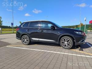 Melns Mitsubishi Outlander 2015 Rīga, ar dzinēja tilpumu 2.20 L un nobraukumu 210 tūkst. km par 5500 €, foto 4 vietnē AUTOMOTO.COM.LV