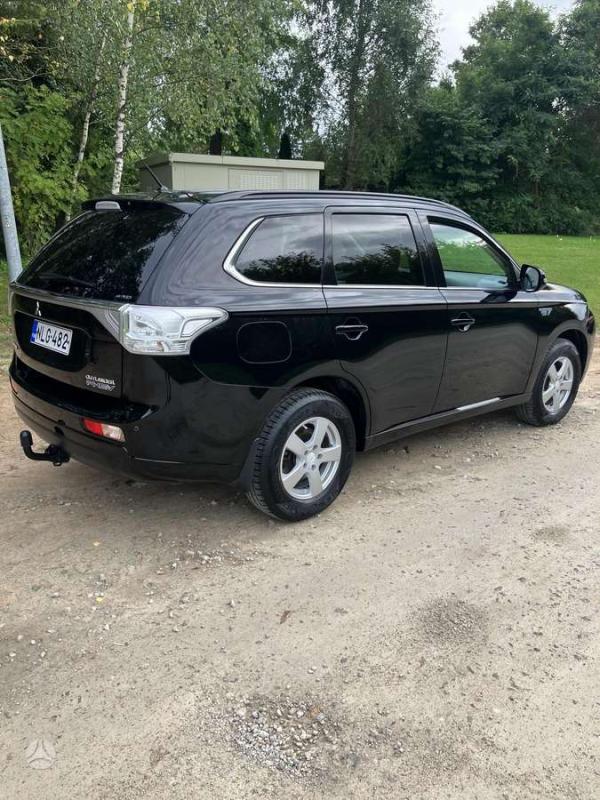 Melns Mitsubishi Outlander 2015 Šauļi, ar dzinēja tilpumu 2.00 L un nobraukumu 256 tūkst. km par 8450 €, foto 6 vietnē AUTOMOTO.COM.LV