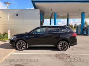 Melns Mitsubishi Outlander 2015 Mardu, ar dzinēja tilpumu 2.00 L un nobraukumu 319 tūkst. km par 9850 €, foto 6 vietnē AUTOMOTO.COM.LV