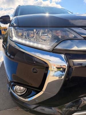 Melns Mitsubishi Outlander 2015 Mardu, ar dzinēja tilpumu 2.00 L un nobraukumu 319 tūkst. km par 9850 €, foto 11 vietnē AUTOMOTO.COM.LV