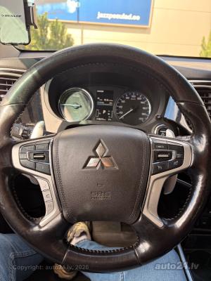 Melns Mitsubishi Outlander 2015 Mardu, ar dzinēja tilpumu 2.00 L un nobraukumu 319 tūkst. km par 9850 €, foto 25 vietnē AUTOMOTO.COM.LV