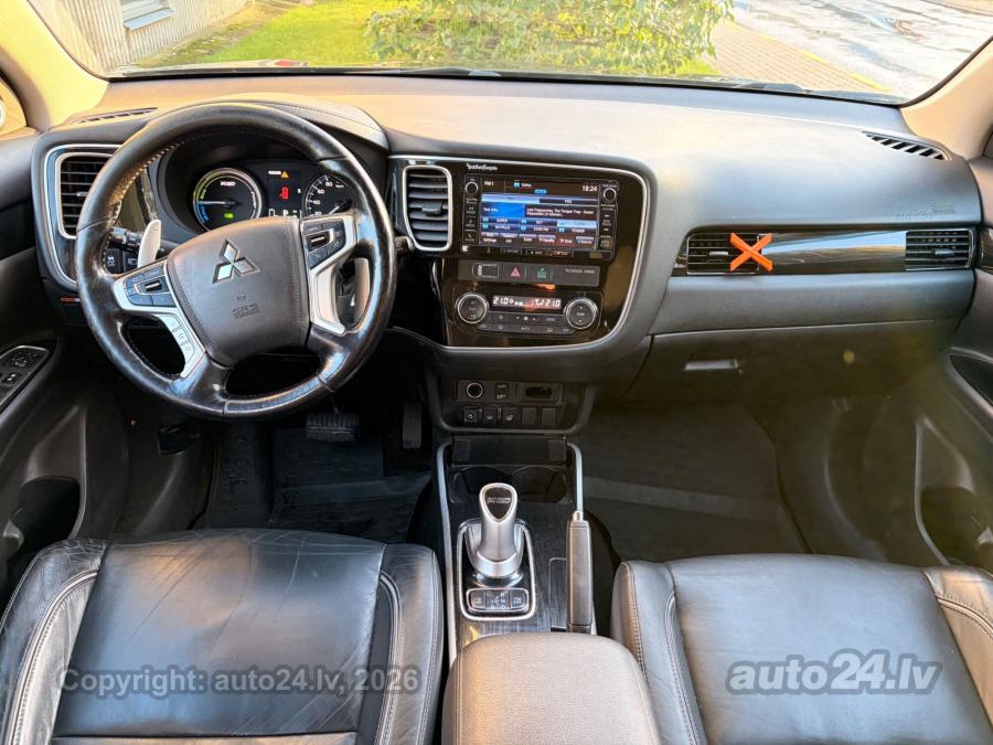 Melns Mitsubishi Outlander 2015 Mardu, ar dzinēja tilpumu 2.00 L un nobraukumu 319 tūkst. km par 9850 €, foto 29 vietnē AUTOMOTO.COM.LV
