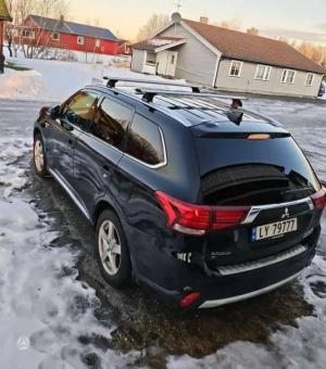 Black Mitsubishi Outlander 2016 in Rokiskis, with an engine capacity of 2.00 L and mileage of 170 thousand km for 7200 €, photo 2 on AUTOMOTO.COM.LV