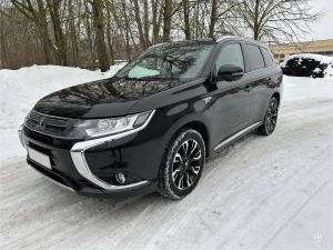Black Mitsubishi Outlander 2016 in Panevezys, with an engine capacity of 2.00 L and mileage of 241 thousand km for 9950 €, photo  on AUTOMOTO.COM.LV