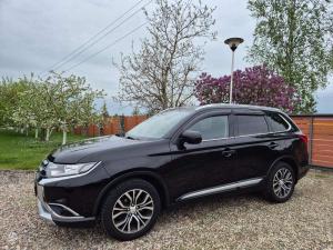 Melns Mitsubishi Outlander 2016 Marijampole, ar dzinēja tilpumu 2.00 L un nobraukumu 212 tūkst. km par 10800 €, foto 4 vietnē AUTOMOTO.COM.LV