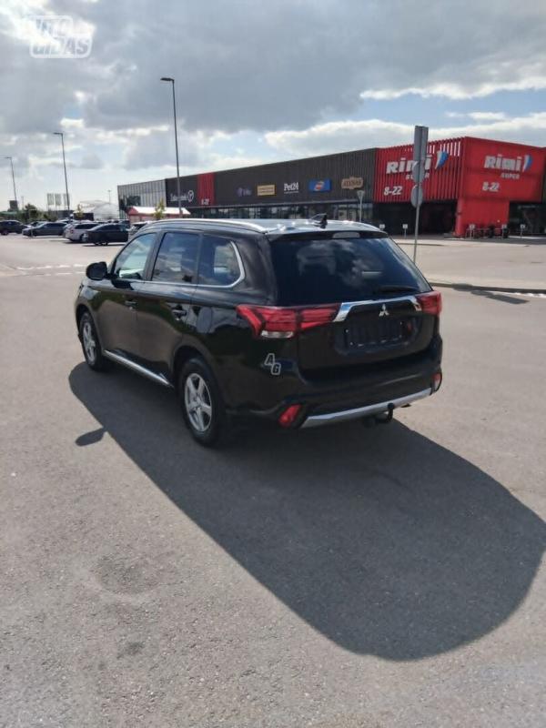 Melns Mitsubishi Outlander 2016 Palanga, ar dzinēja tilpumu 2.00 L un nobraukumu 167 tūkst. km par 12250 €, foto 5 vietnē AUTOMOTO.COM.LV