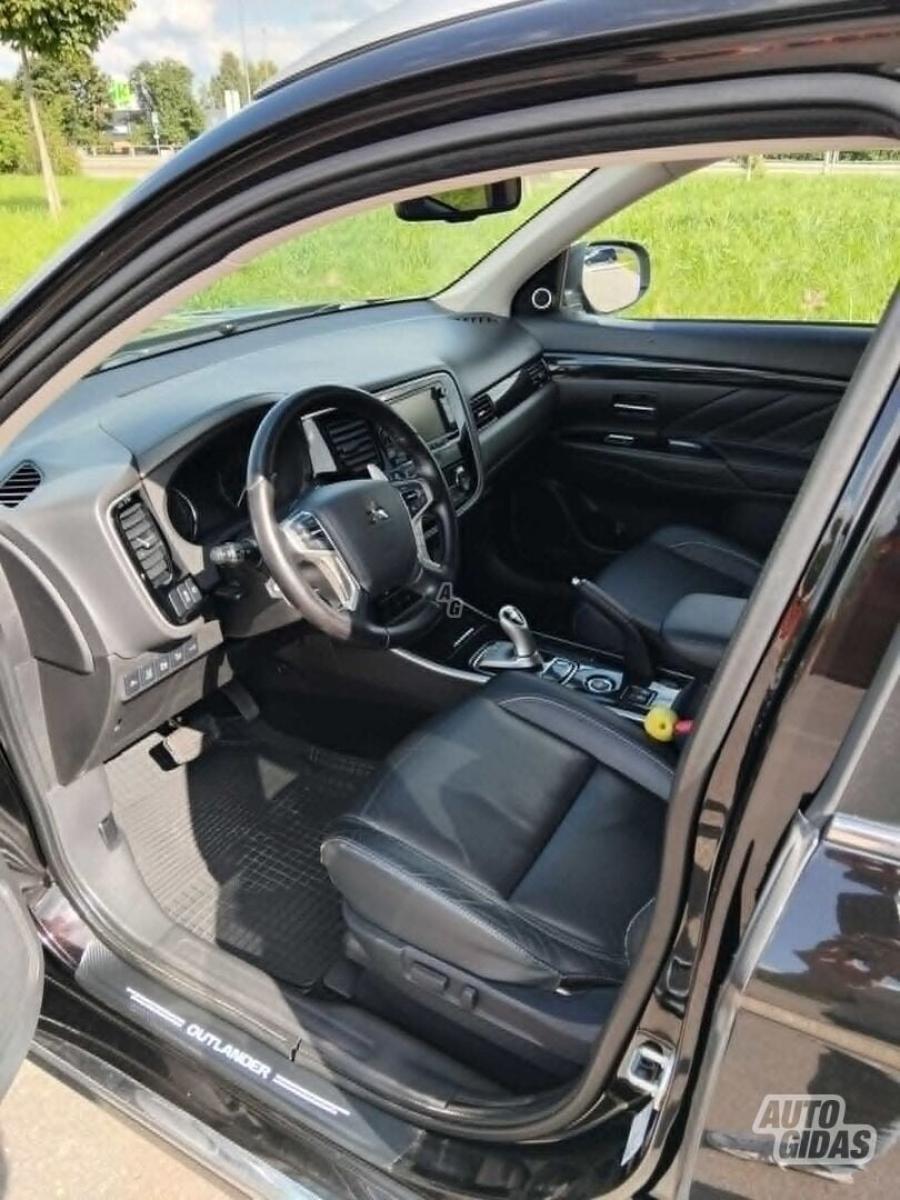 Melns Mitsubishi Outlander 2016 Palanga, ar dzinēja tilpumu 2.00 L un nobraukumu 167 tūkst. km par 12250 €, foto 8 vietnē AUTOMOTO.COM.LV