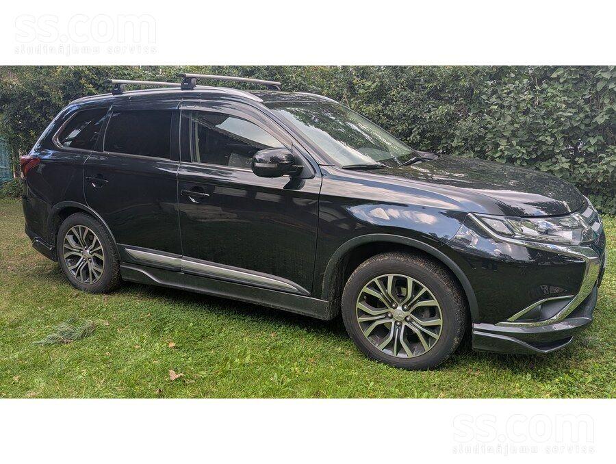 Melns Mitsubishi Outlander 2016 Rīga, ar dzinēja tilpumu 2.30 L un nobraukumu 119 tūkst. km par 13500 €, foto 1 vietnē AUTOMOTO.COM.LV