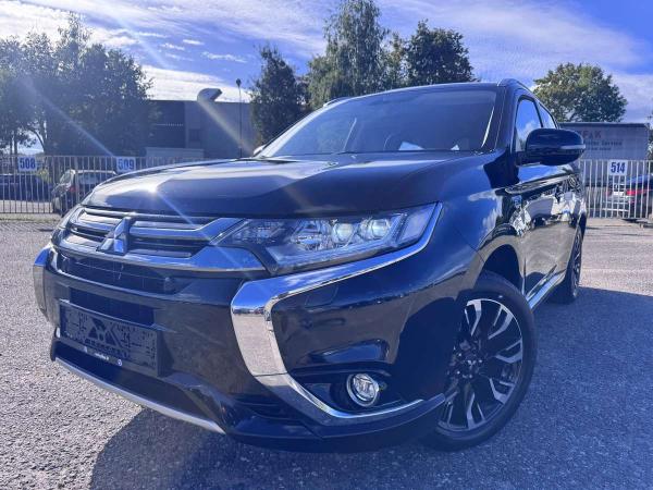 Black Mitsubishi Outlander 2016 in Alytus, with an engine capacity of 2.00 L and mileage of 220 thousand km for 10900 €, photo 6 on AUTOMOTO.COM.LV