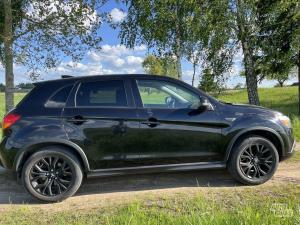 Melns Mitsubishi Outlander 2017 Viļņa, ar dzinēja tilpumu 2.00 L un nobraukumu 187 tūkst. km par 9700 €, foto 8 vietnē AUTOMOTO.COM.LV