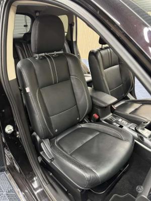 Black Mitsubishi Outlander 2017 in Marijampole, with an engine capacity of 2.00 L and mileage of 217 thousand km for 11950 €, photo 18 on AUTOMOTO.COM.LV