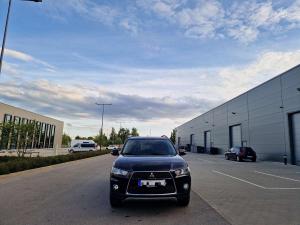 Melns Mitsubishi Outlander 2011 Viļņa, ar dzinēja tilpumu 2.40 L un nobraukumu 215 tūkst. km par 3499 €, foto 4 vietnē AUTOMOTO.COM.LV