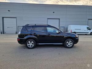 Melns Mitsubishi Outlander 2011 Viļņa, ar dzinēja tilpumu 2.40 L un nobraukumu 215 tūkst. km par 3499 €, foto 6 vietnē AUTOMOTO.COM.LV