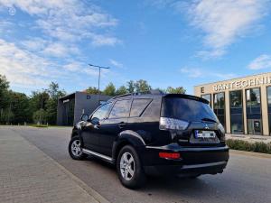 Melns Mitsubishi Outlander 2011 Viļņa, ar dzinēja tilpumu 2.40 L un nobraukumu 215 tūkst. km par 3499 €, foto 7 vietnē AUTOMOTO.COM.LV