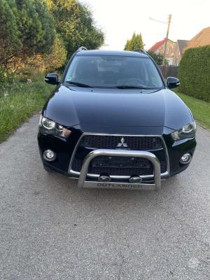 Black Mitsubishi Outlander 2012 in Kaunas, with an engine capacity of 2.20 L and mileage of 179 thousand km for 6150 €, photo  on AUTOMOTO.COM.LV