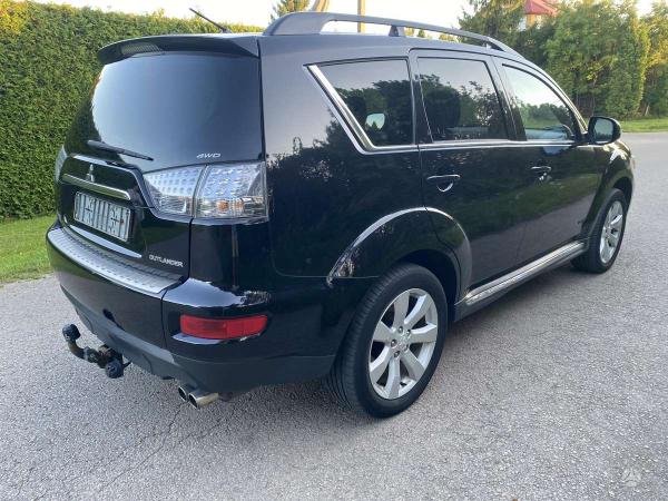 Melns Mitsubishi Outlander 2012 Kauņa, ar dzinēja tilpumu 2.20 L un nobraukumu 179 tūkst. km par 6150 €, foto 5 vietnē AUTOMOTO.COM.LV