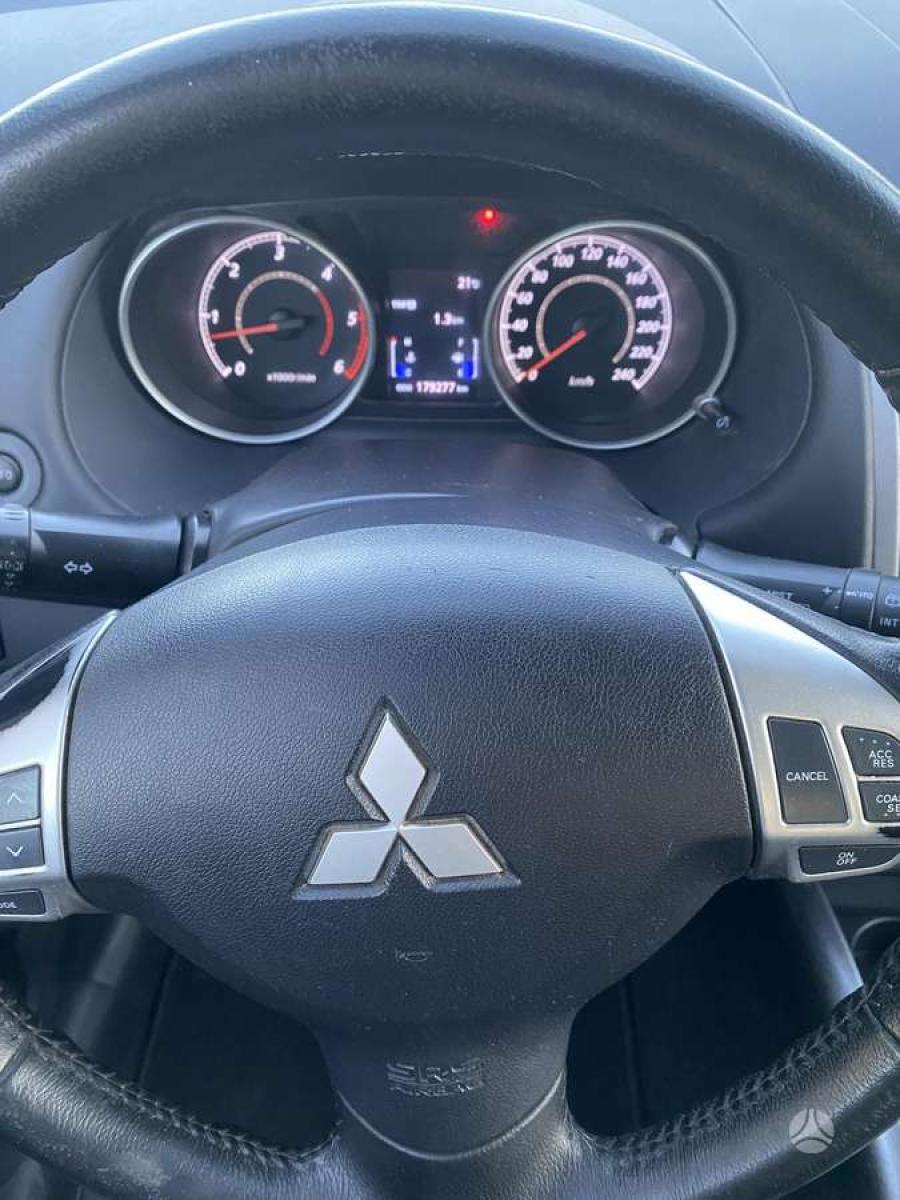 Melns Mitsubishi Outlander 2012 Kauņa, ar dzinēja tilpumu 2.20 L un nobraukumu 179 tūkst. km par 6150 €, foto 12 vietnē AUTOMOTO.COM.LV